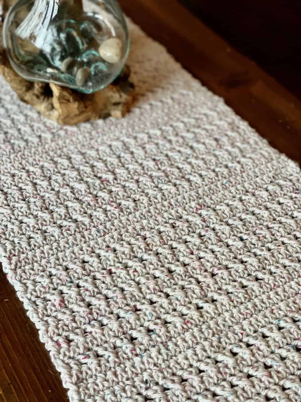 A crochet table runner that's functional and stylish | MadameStitch