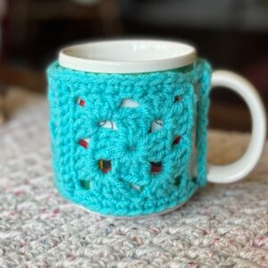A special crochet mug cozy is all you need to keep your coffee piping ...
